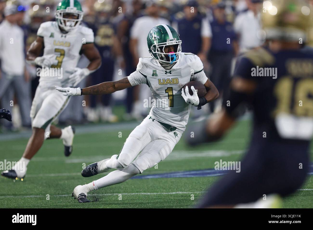UAB wide receiver Corri Milliner (1) picks up yardage after a reception ...