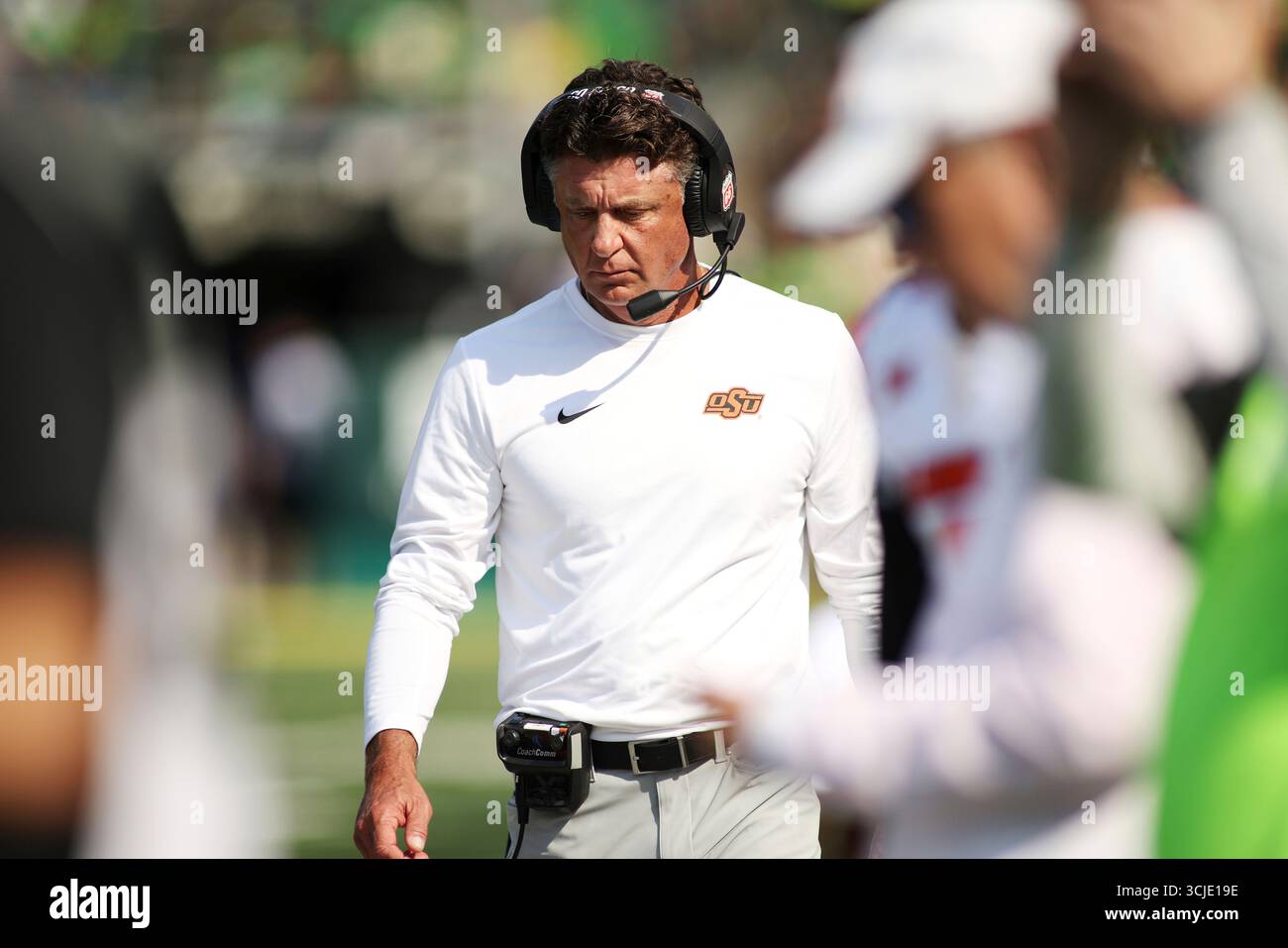 Oklahoma State head coach Mike Gundy walks along the sideline during ...