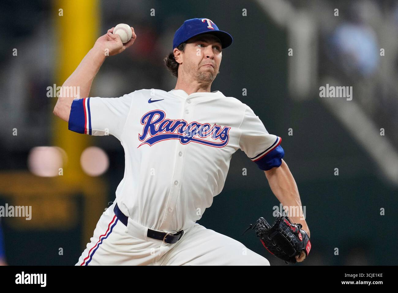 Texas Rangers starting pitcher Jacob deGrom throws to the Houston ...