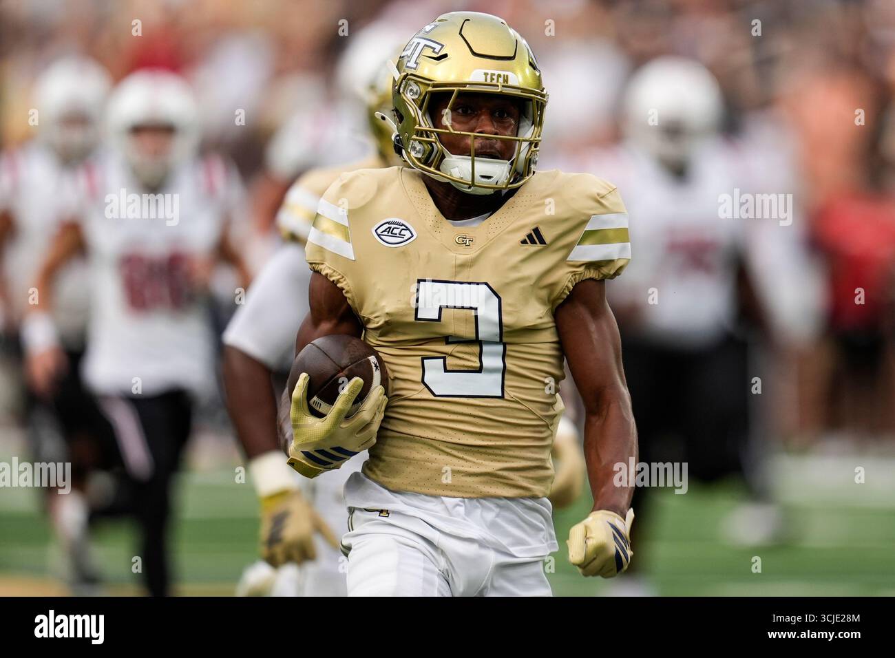 Georgia Tech linebacker Melvin Jordan IV (0) runs for a touchdown ...