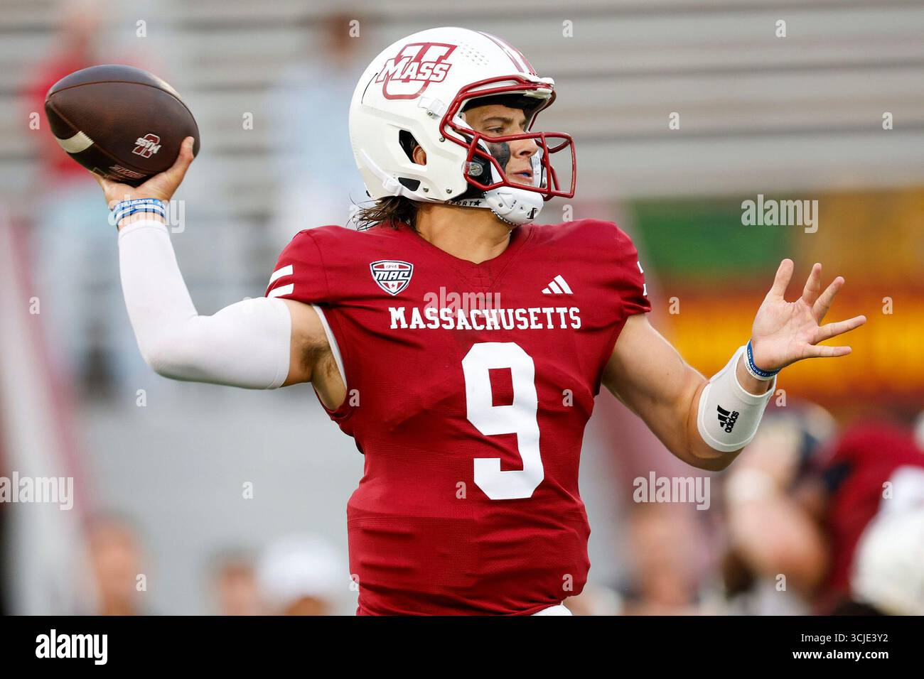 Massachusetts quarterback Grant Jordan (9) makes a pass during the ...