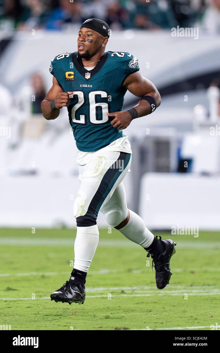 Philadelphia Eagles running back Saquon Barkley warms up after the delay due to lightning in the ...