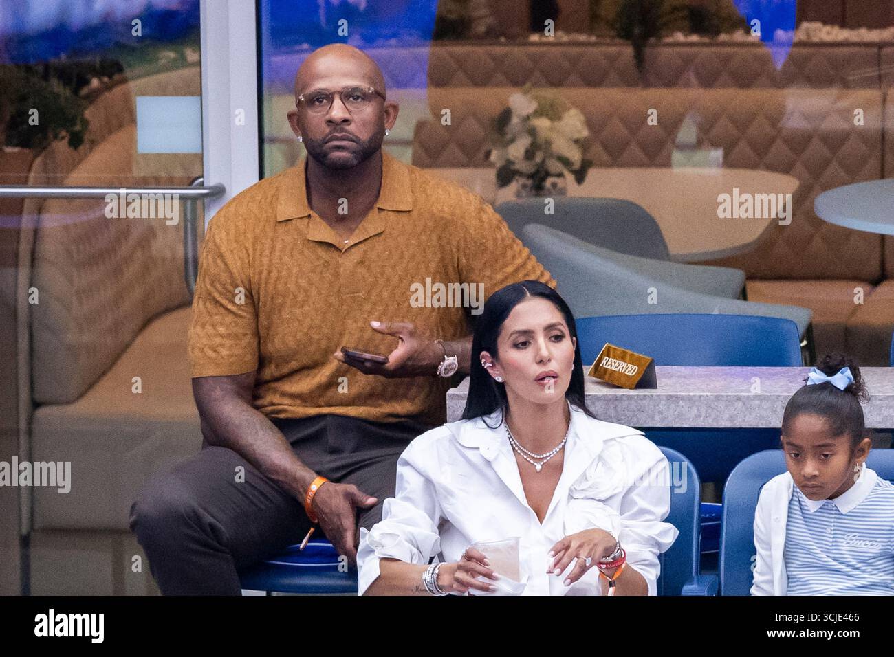 Retired New York Yankee pitcher CC Sabbathia watches Aryna Sabalenka of ...