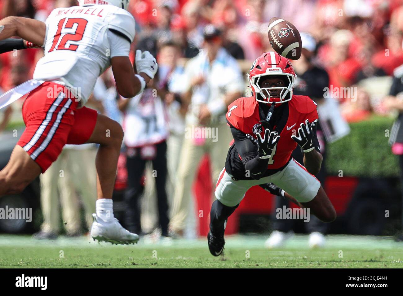 Georgia defensive back Ellis Robinson IV (1) intercepts a pass during ...