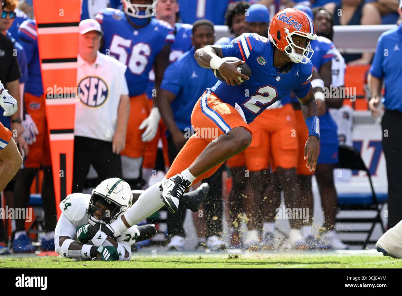 Florida quarterback DJ Lagway (2) is brought down by South Florida ...