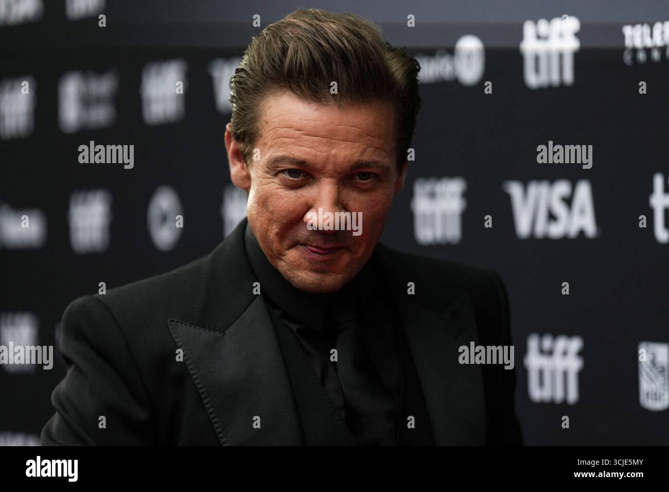 Jeremy Renner arrives on the red carpet to promote the film "Wake Up ...