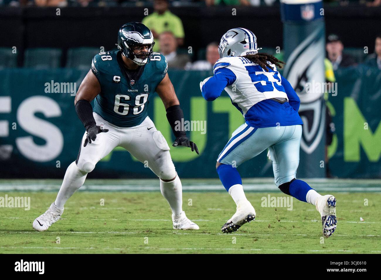 Philadelphia Eagles guard Landon Dickerson, left, in action against ...