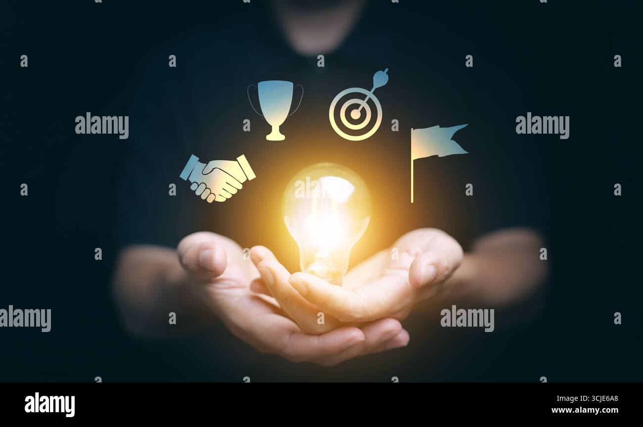 Achievement target trophy bulb hi-res stock photography and images - Alamy