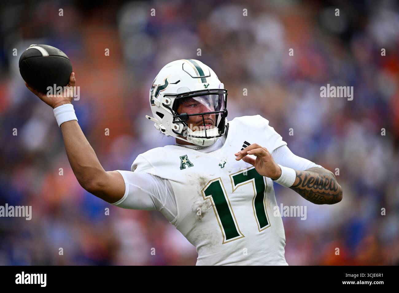 South Florida quarterback Byrum Brown (17) throws during the first half ...