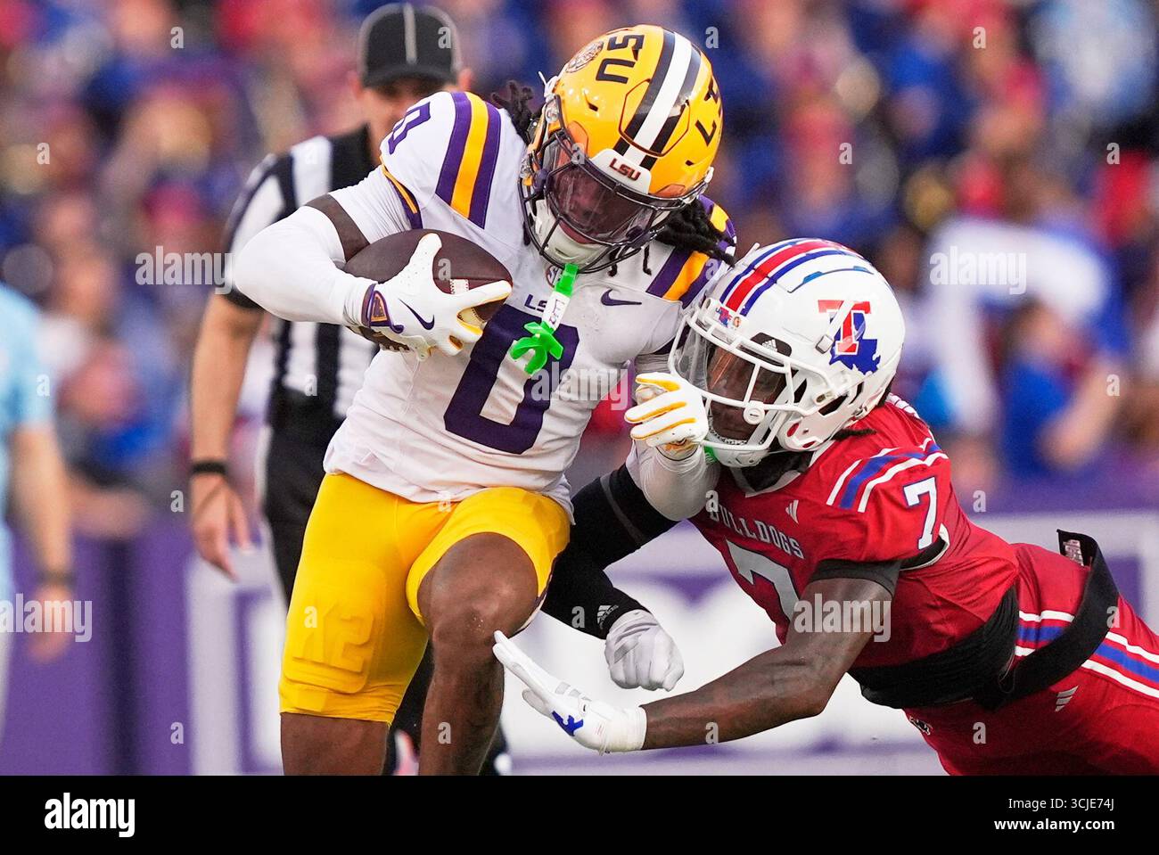 LSU wide receiver Zavion Thomas (0) carries on a pass reception against ...