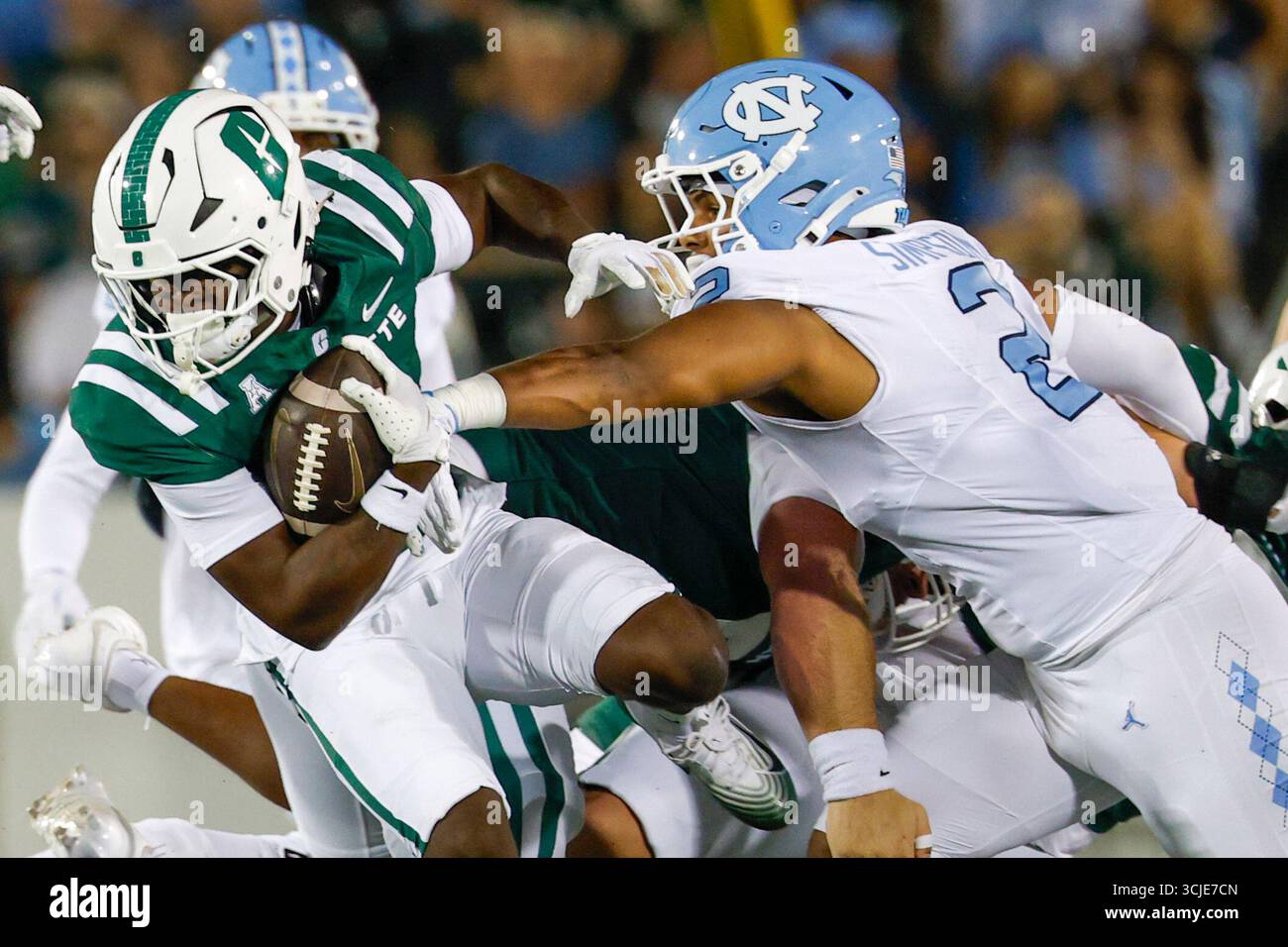 Charlotte running back Rod Gainey Jr., left, rushes the ball against ...