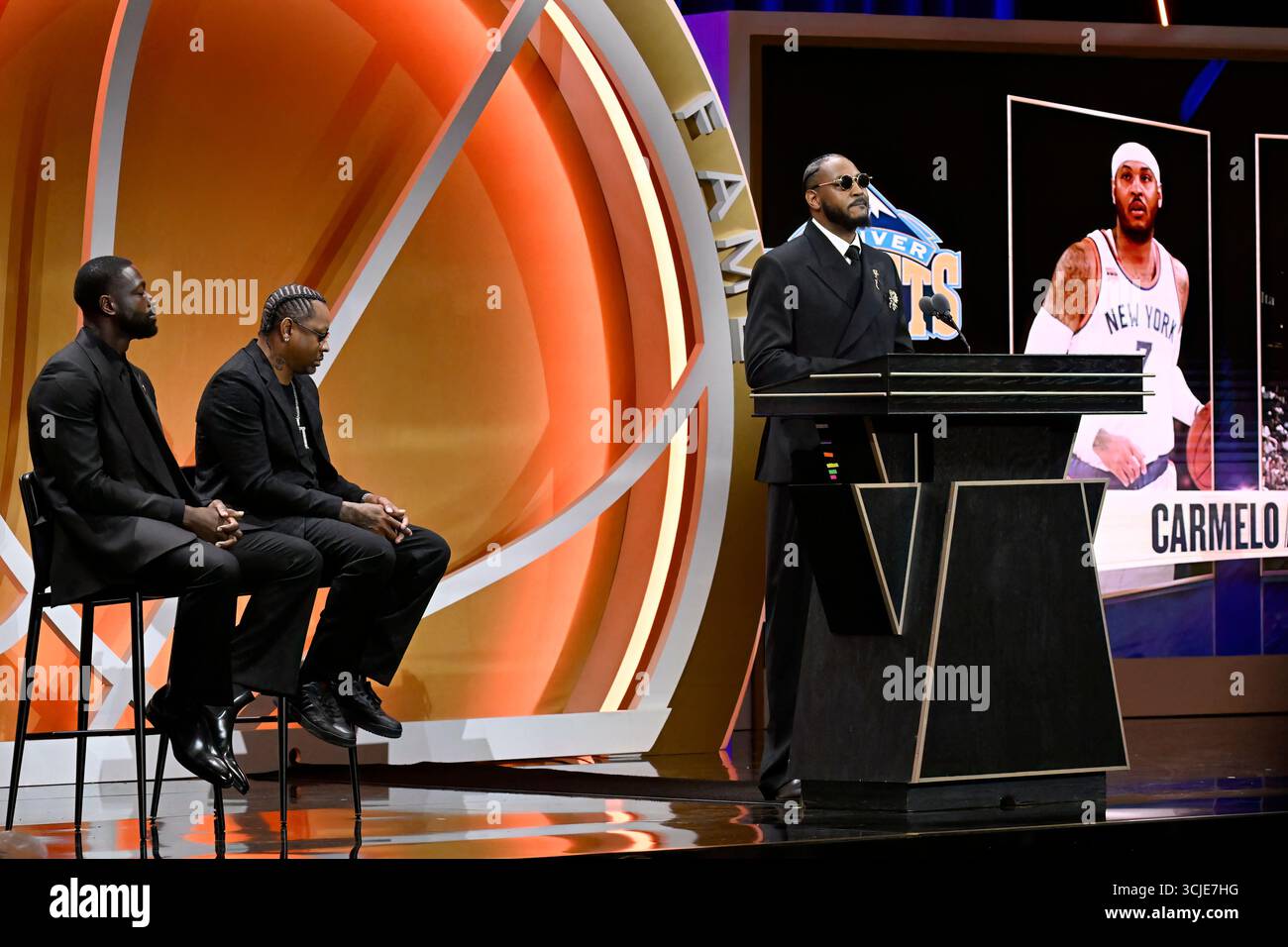 Carmelo Anthony, right, speaks During his enshrinement in the ...