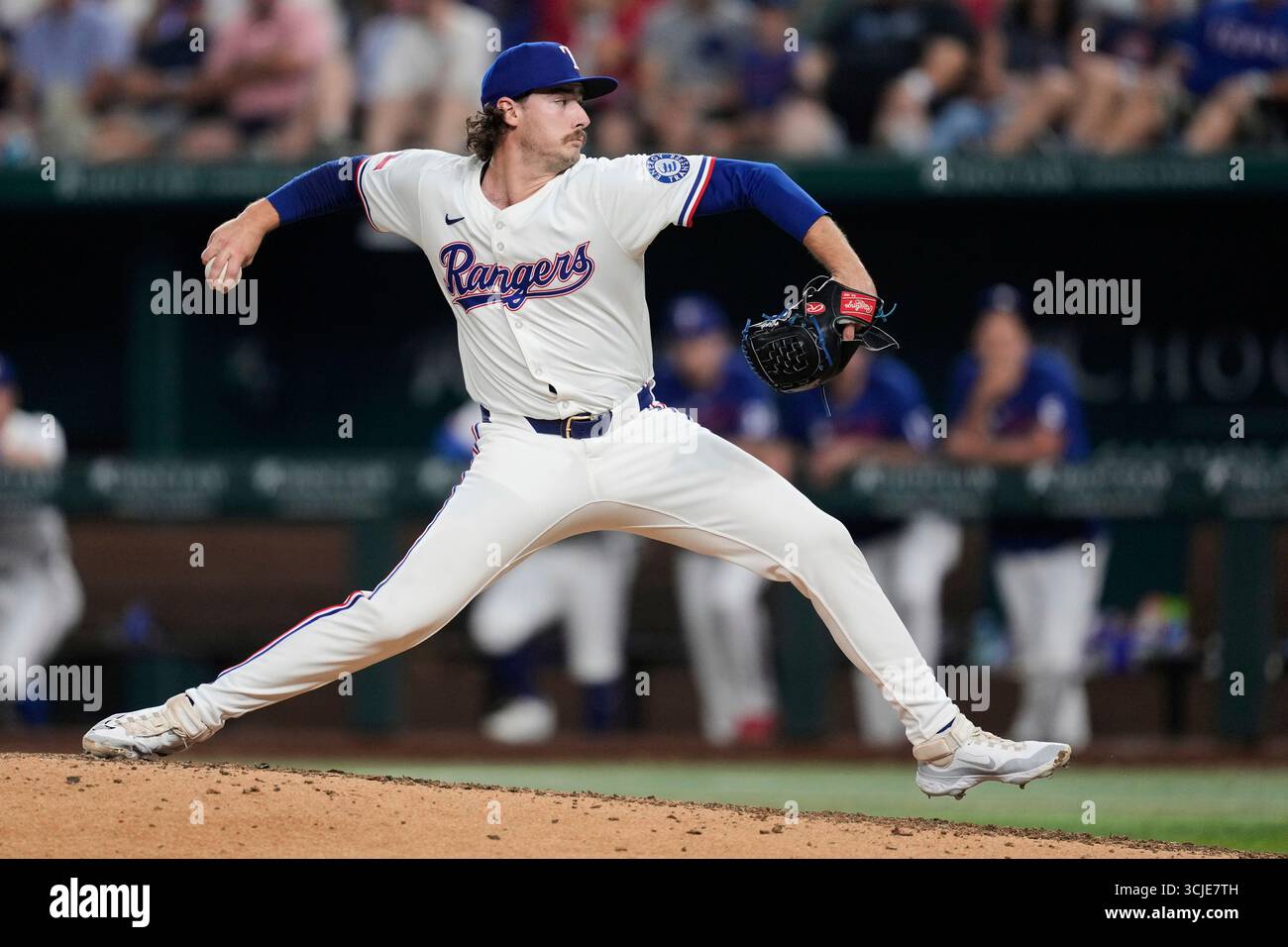 Texas Rangers relief pitcher Cole Winn throws to the Houston Astros in ...
