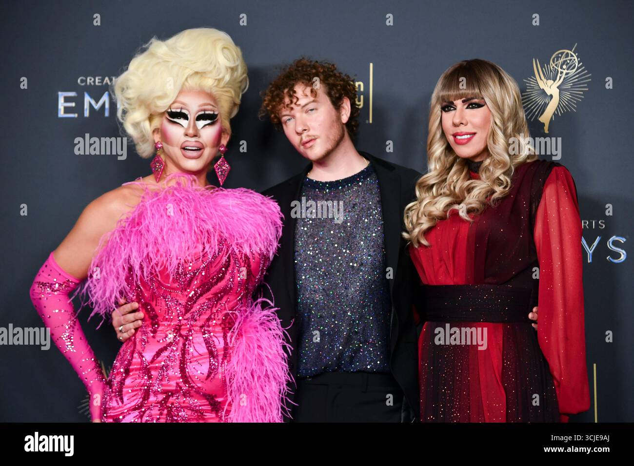 Trixie Mattel, from left, John Mark Hostetler, and Kelly Mantle attend ...