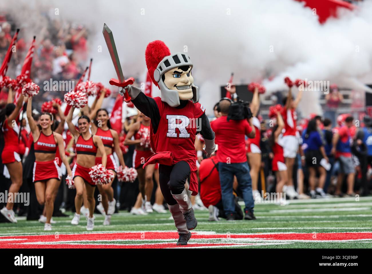 September 06, 2025: Sir Henry leads the Scarlet Knights onto the field ...