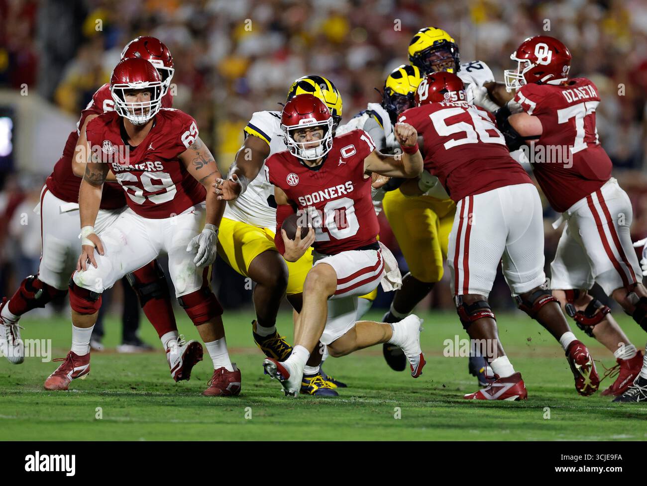 Oklahoma quarterback John Mateer (10) runs the ball against Michigan ...