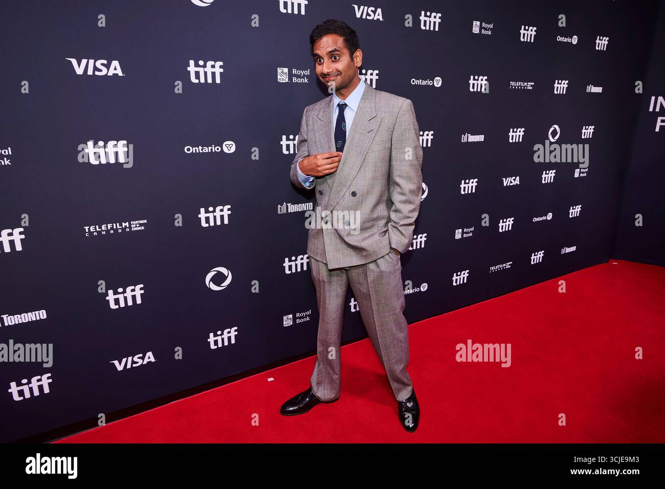 Director and actor Aziz Ansari is photographed on the red carpet for ...