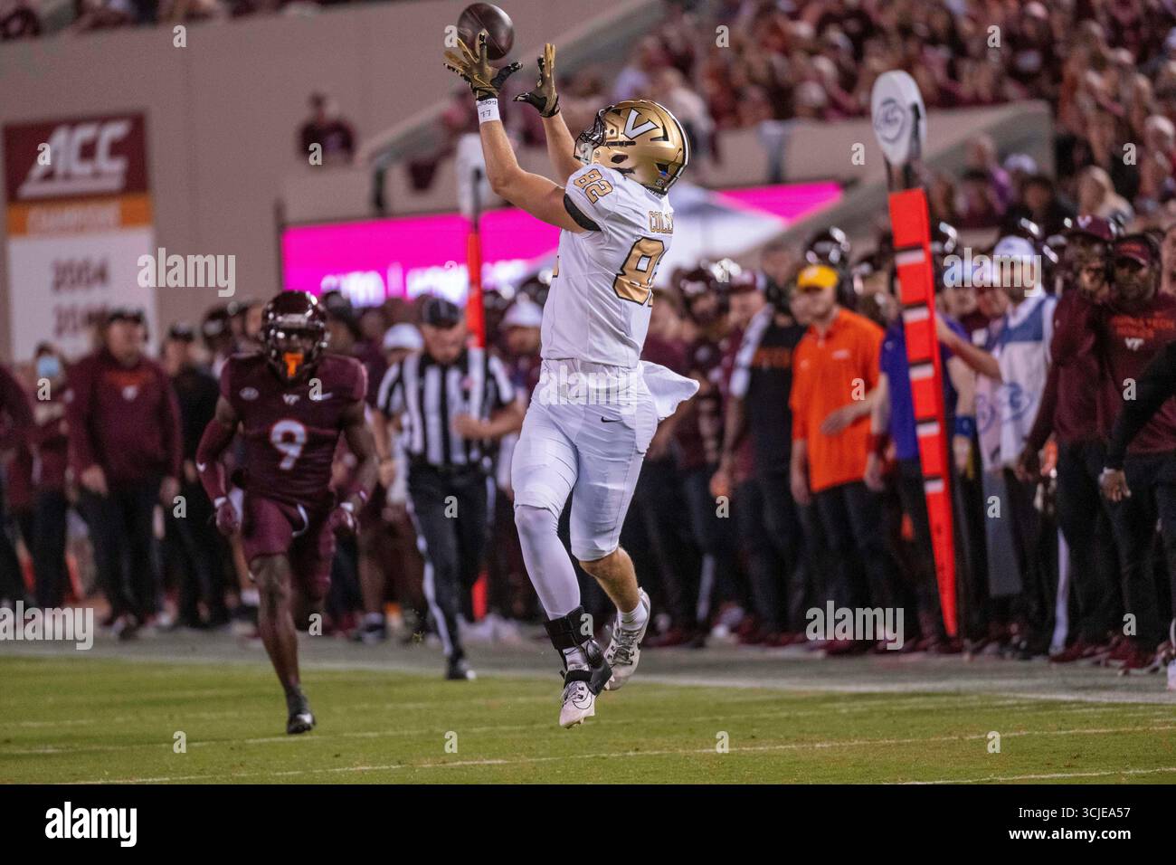 Vanderbilt tight end Brycen Coleman, center, catches the pass for a ...