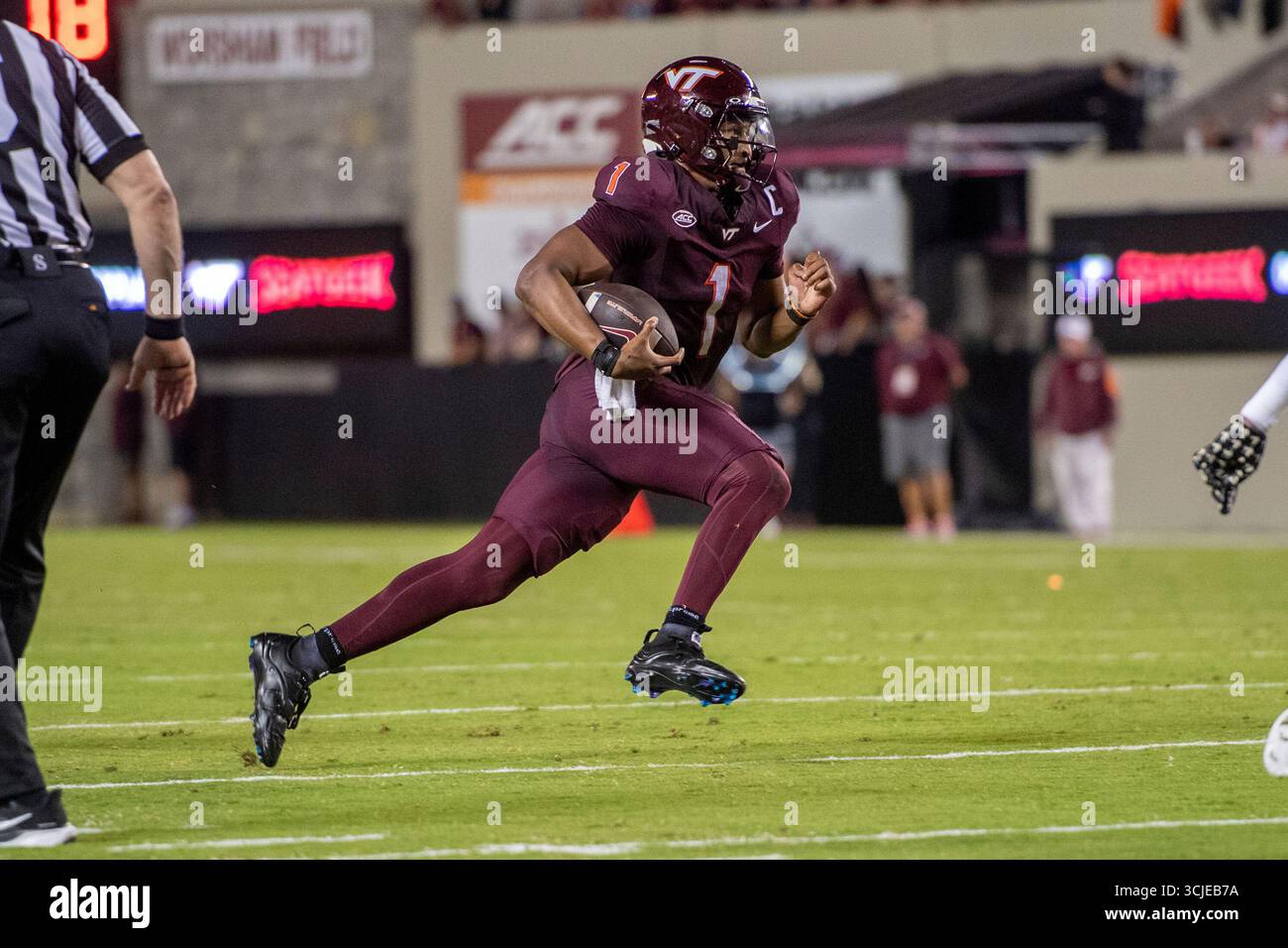 Virginia Tech quarterback Kyron Drones (1) runs the ball against Vanderbilt during the first ...