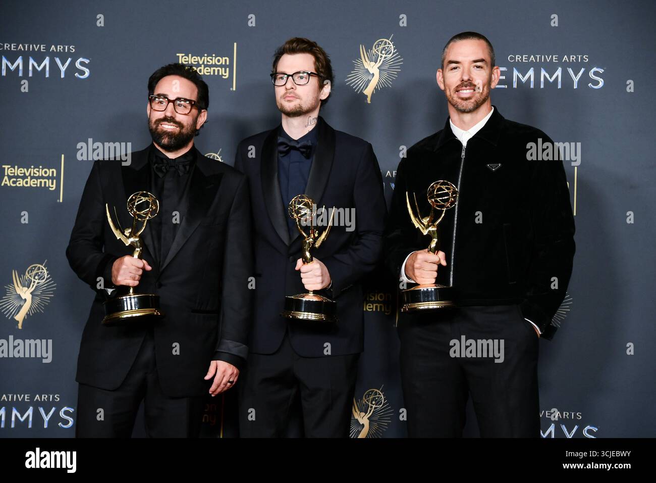 Brandon Beck, from left, Christian Linke, and Marc Merrill pose in the ...