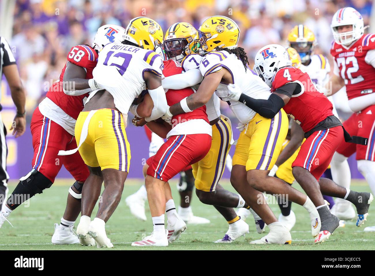 A host of LSU Tigers defenders tackle Louisiana Tech Bulldogs ...