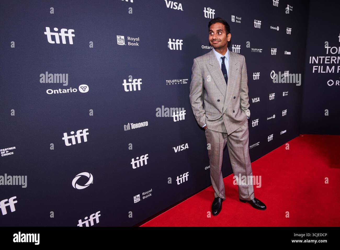 Director and actor Aziz Ansari is photographed on the red carpet for ...