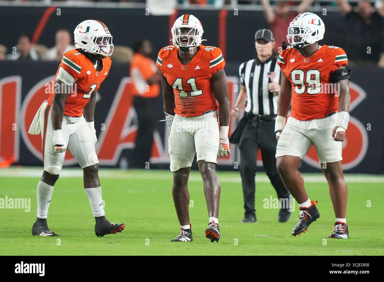Miami linebacker Chase Smith (41) reacts after recovering a fumble ...