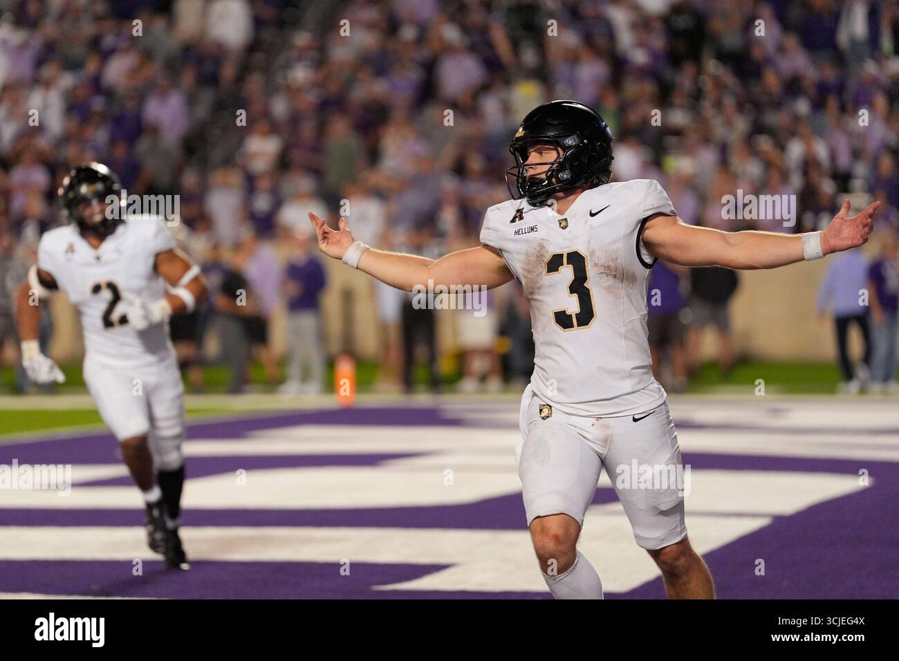 Army quarterback Cale Hellums (3) celebrates after making a touchdown ...