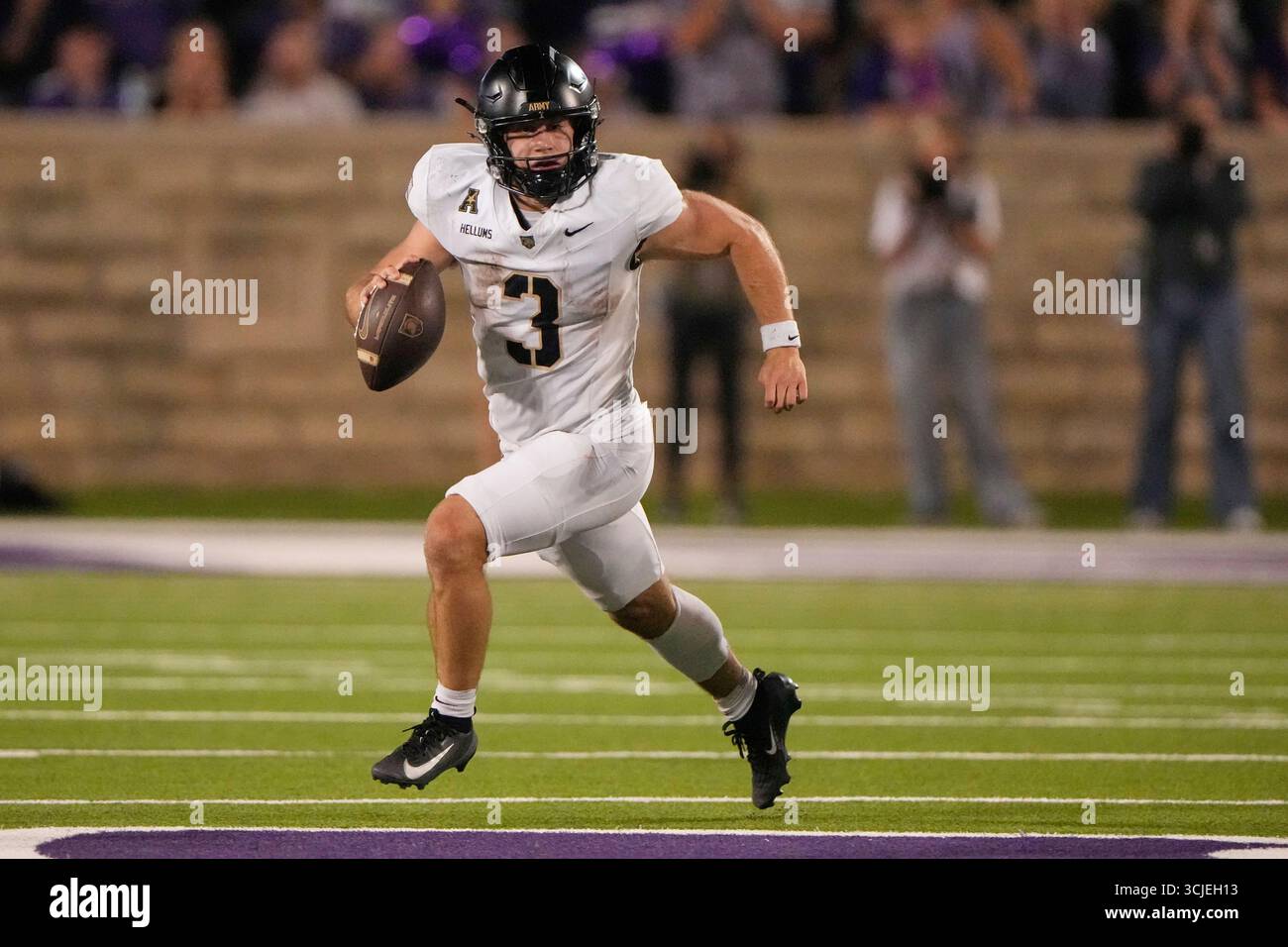 Army quarterback Cale Hellums runs the ball during the second half of ...