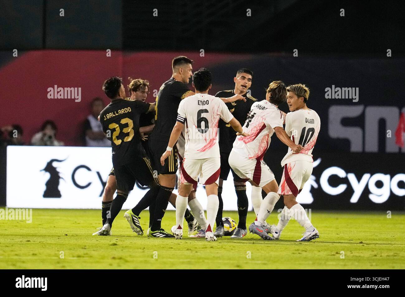 Players are separated during the first half of an international ...