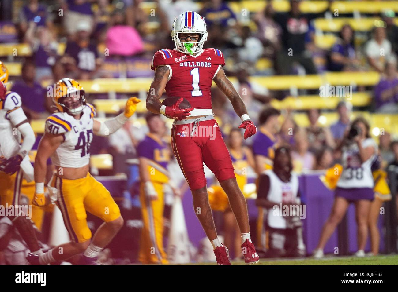 Louisiana Tech wide receiver Devin Gandy (1) carries for a touchdown in ...