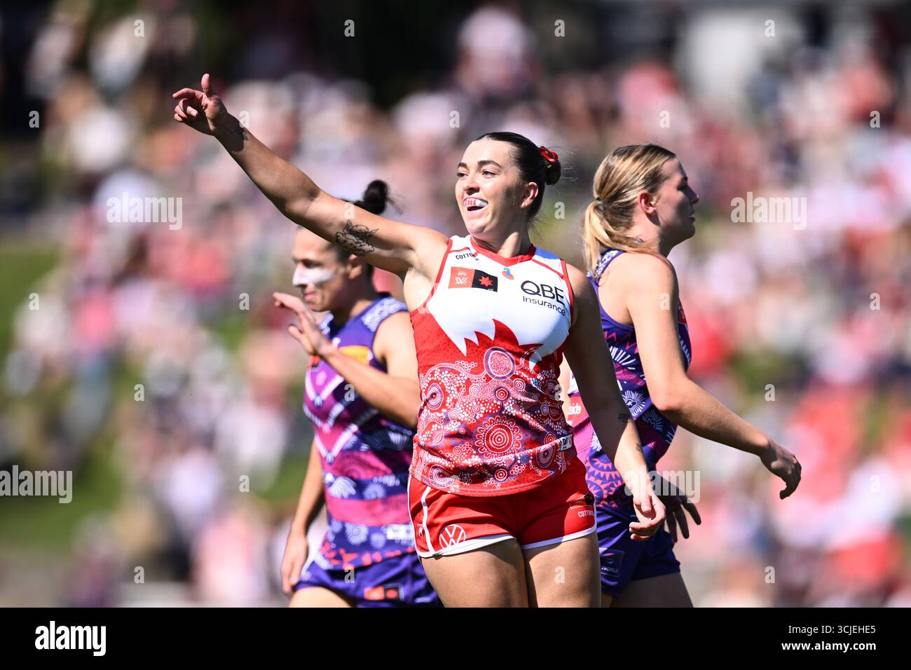 Cynthia Hamilton of the Swans celebrates after scoring a goal AFLW ...