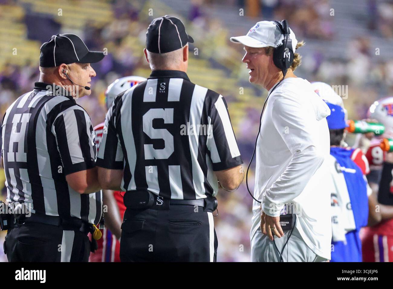 Louisiana Tech Bulldogs head coach Sonny Cumbie talks to the referees ...
