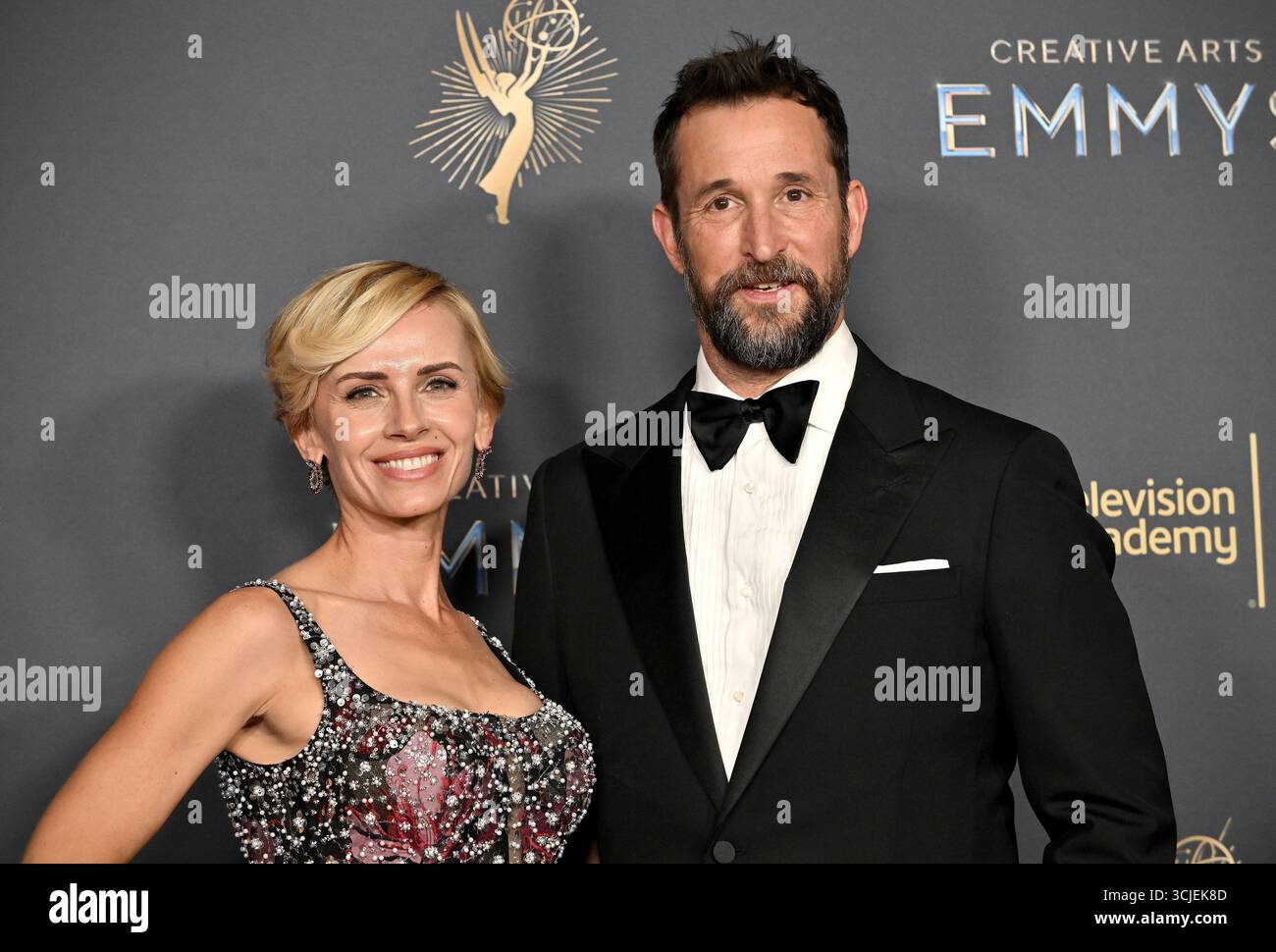 Sara Wells and Noah Wyle in the pressroom at the 2025 Creative Arts Emmy Awards at the Peacock ...