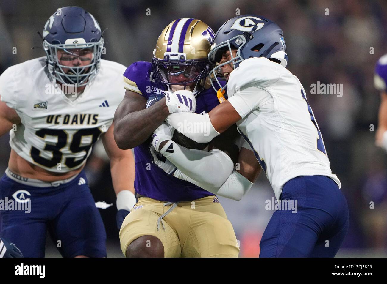 Washington running back Jonah Coleman (1) carries the ball against UC ...