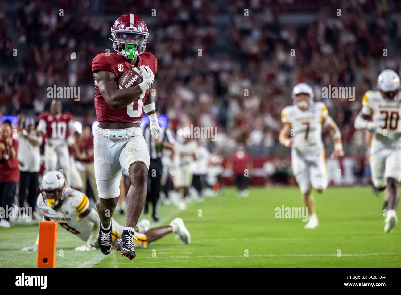Alabama running back AK Dear (0) scores a touchdown on a 56-yard run ...