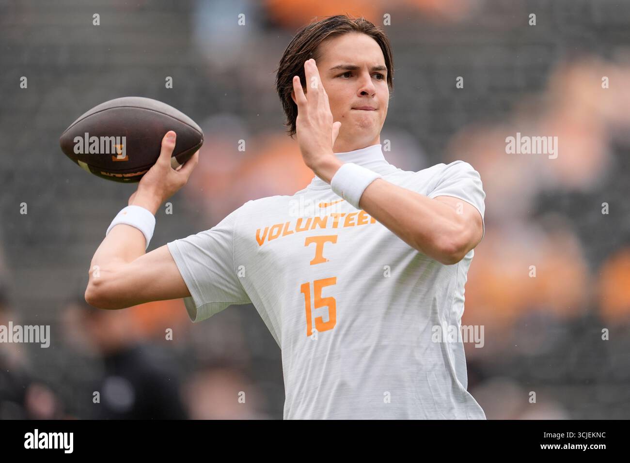 Tennessee quarterback George MacIntyre (15) looks to throw a pass ...