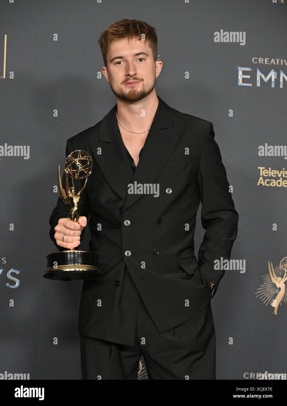 Matthew Lewis in the pressroom at the 2025 Creative Arts Emmy Awards at ...