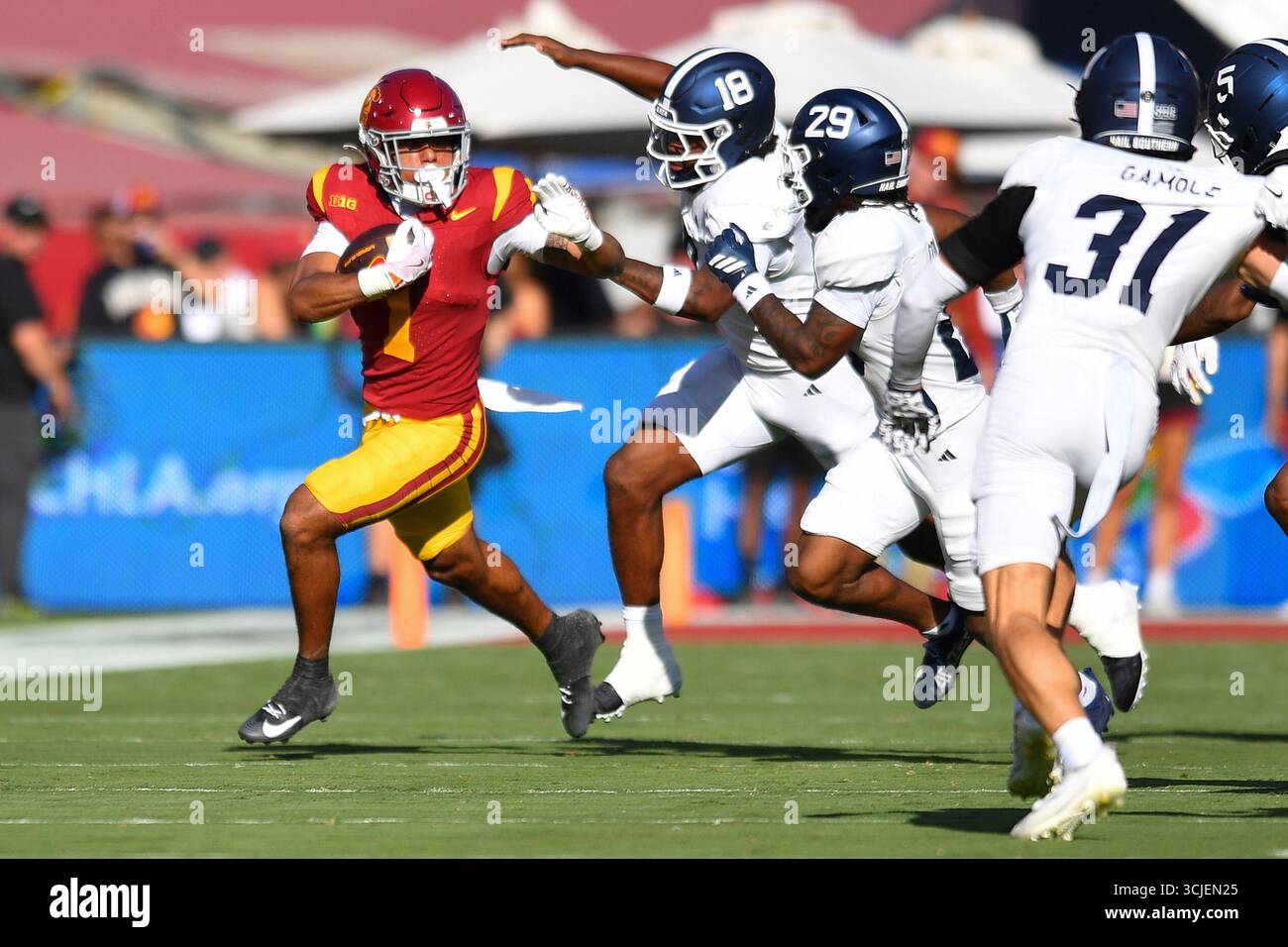 LOS ANGELES, CA - SEPTEMBER 06: USC Trojans running back Eli Sanders (1) tries to outrun ...
