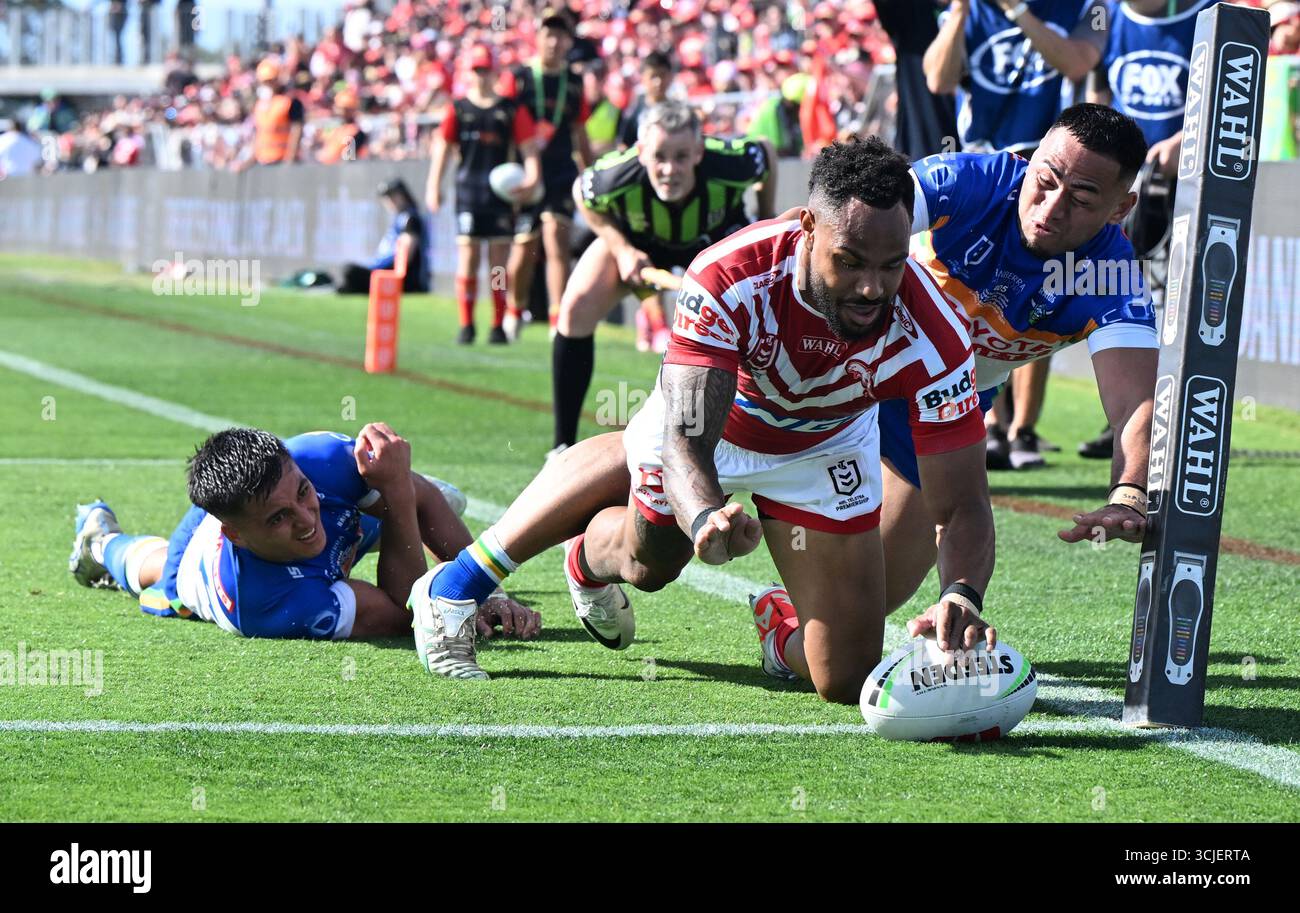 Hamiso Tabuai-Fidow of the Dolphins scores a try during the NRL Round ...