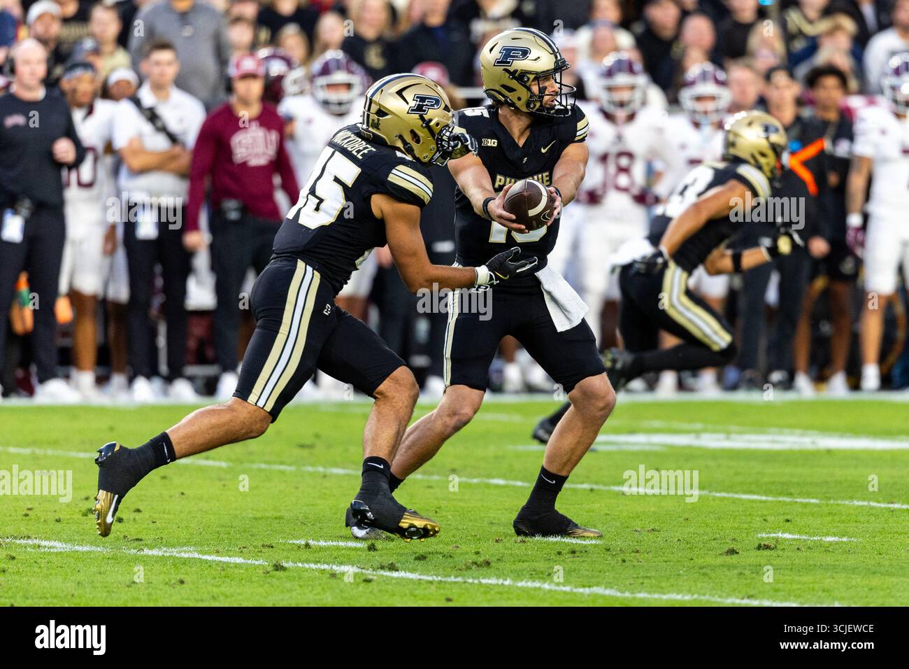 September 06, 2025: Purdue quarterback Ryan Browne (15) hands the ball ...