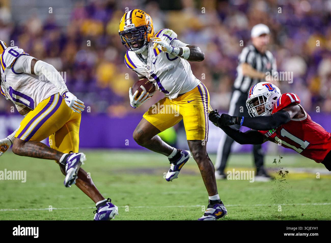 September 6, 2025: LSU receiver Aaron Anderson (1) looks for running ...