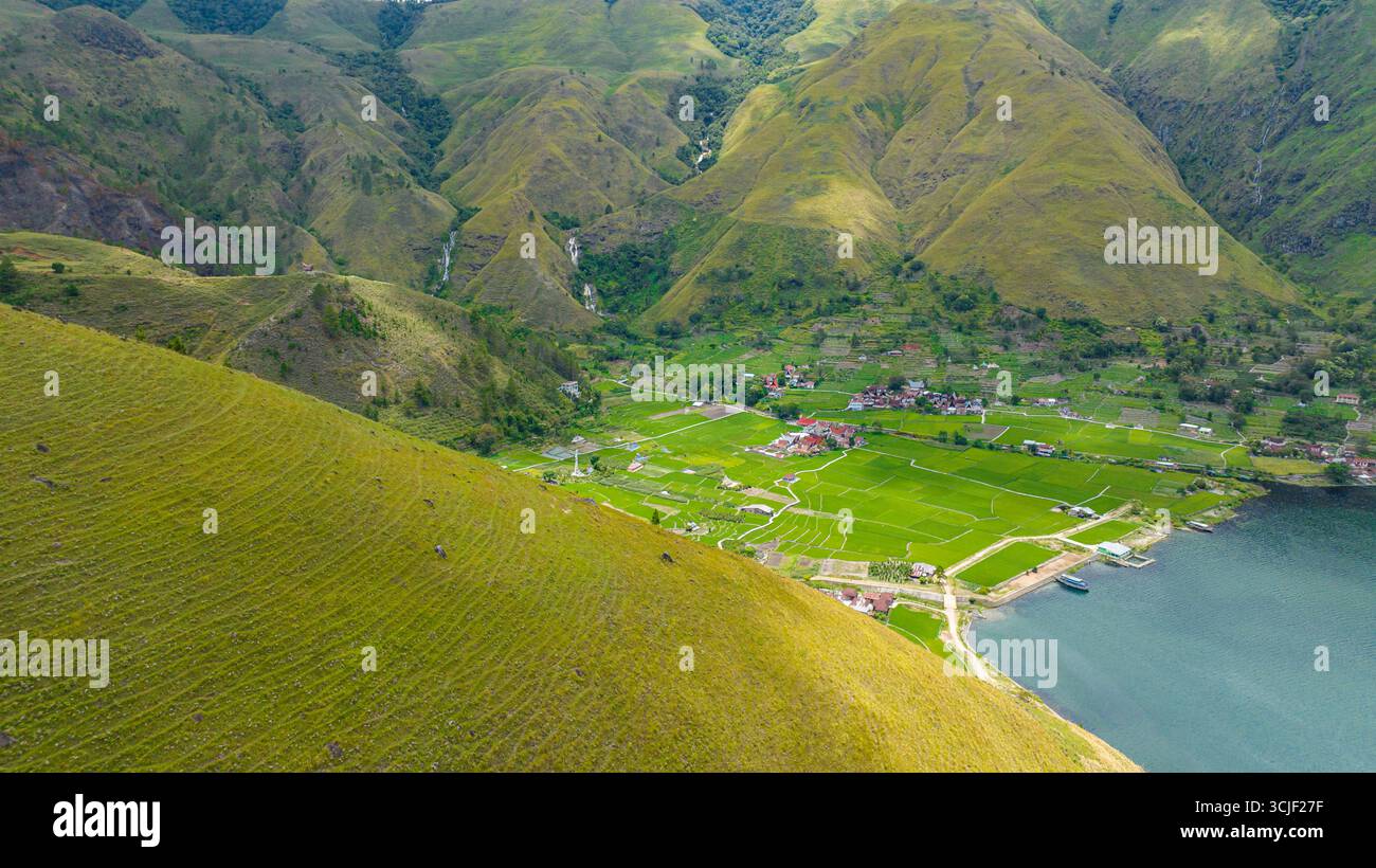 Farmland in a mountain valley on Lake Toba. Sumatra, Indonesia Stock ...