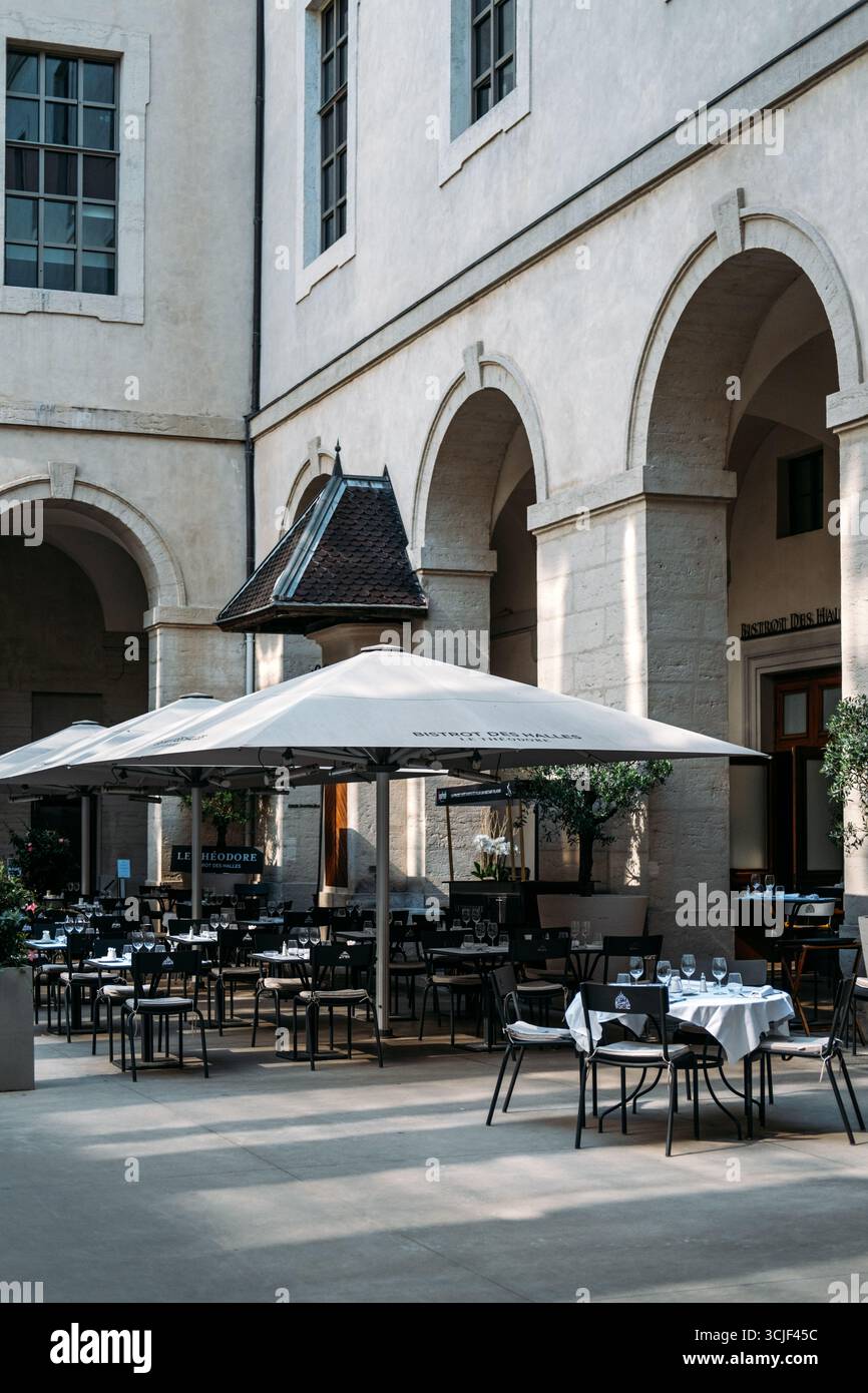 Elegant outdoor dining terrace at Bistrot des Halles inside Grand Hotel ...