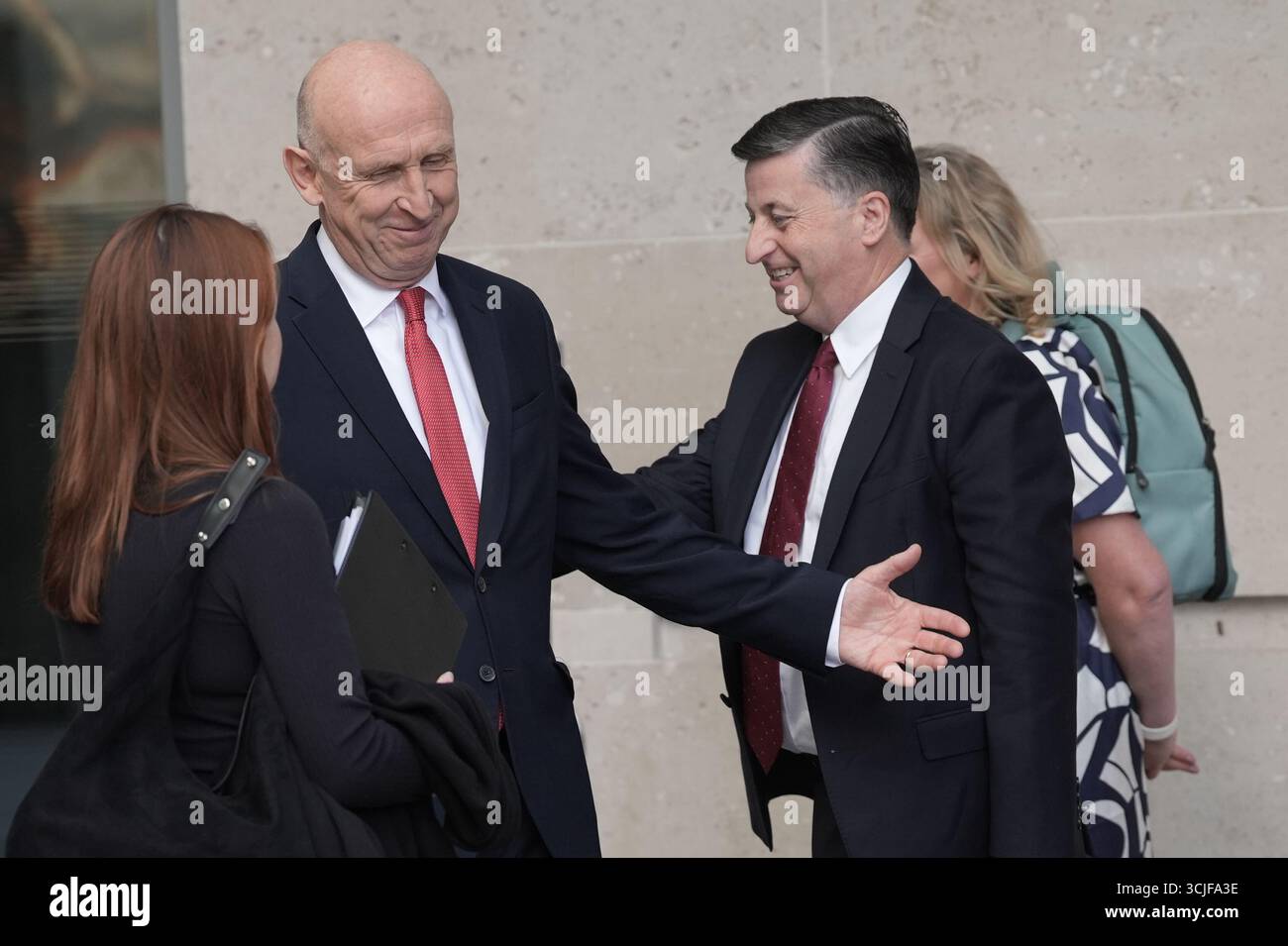 Defence Secretary John Healey meeting Douglas Alexander outside BBC ...