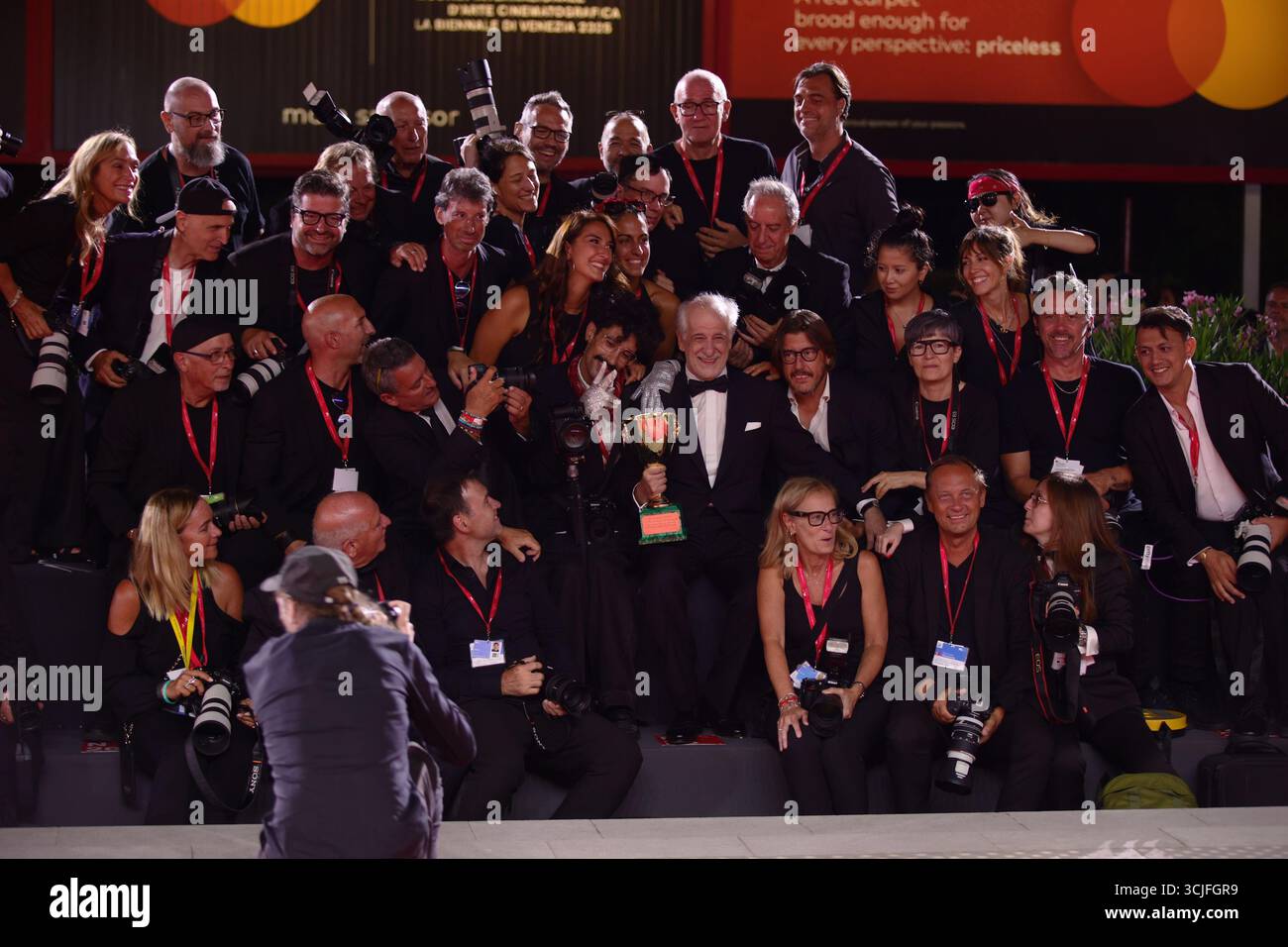 Toni Servillo holds the Coppa Volpi for Best Actor for “La Grazia ...