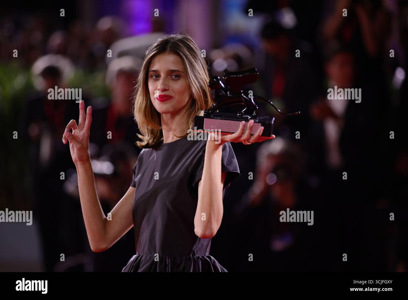 Benedetta Porcaroli holds the Orizzonti Best Actress Award for "Il ...