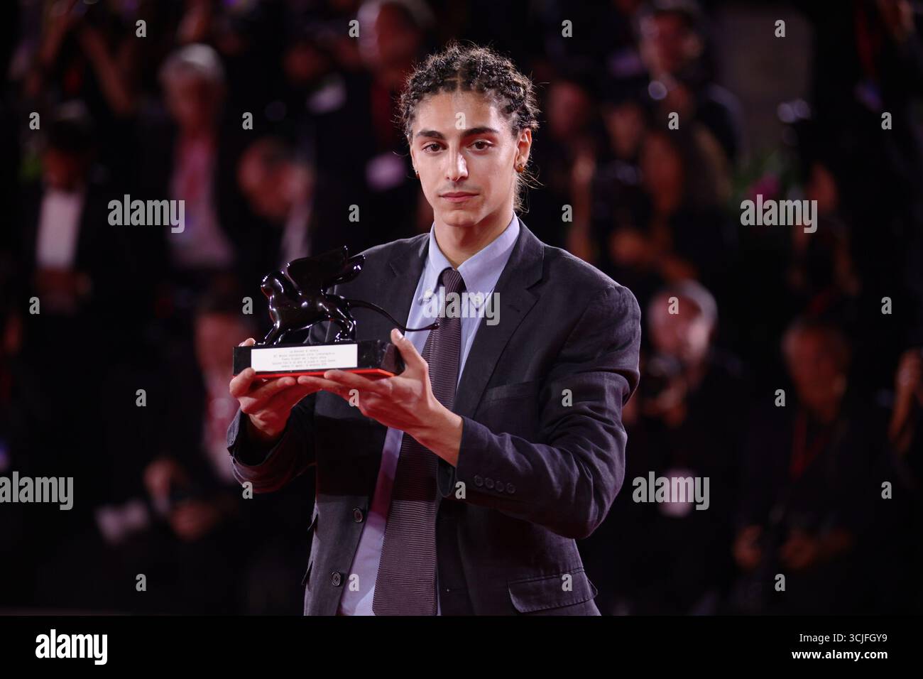 Giacomo Covi holds the Orizzonti Best Actor Award for “Un Anno di ...