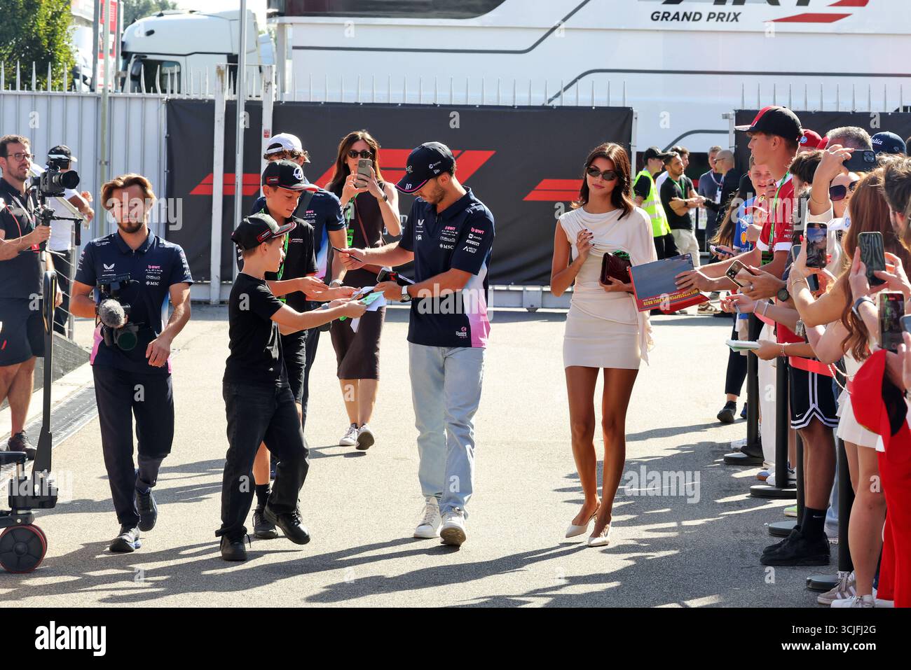 (L to R): Pierre Gasly (FRA) Alpine F1 Team with his girlfriend Kika ...