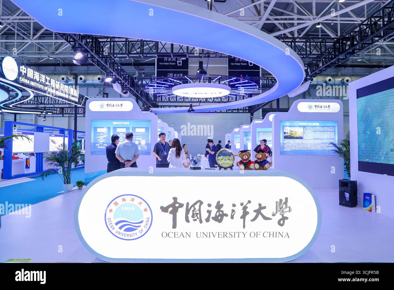 QINGDAO, CHINA - SEPTEMBER 7, 2025 - Attendees consult at the Ocean University of China booth at ...